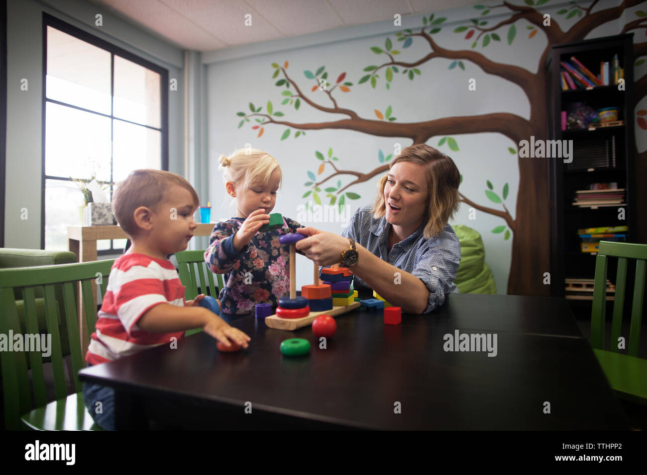 Preschool children playing hi-res stock photography and images - Alamy