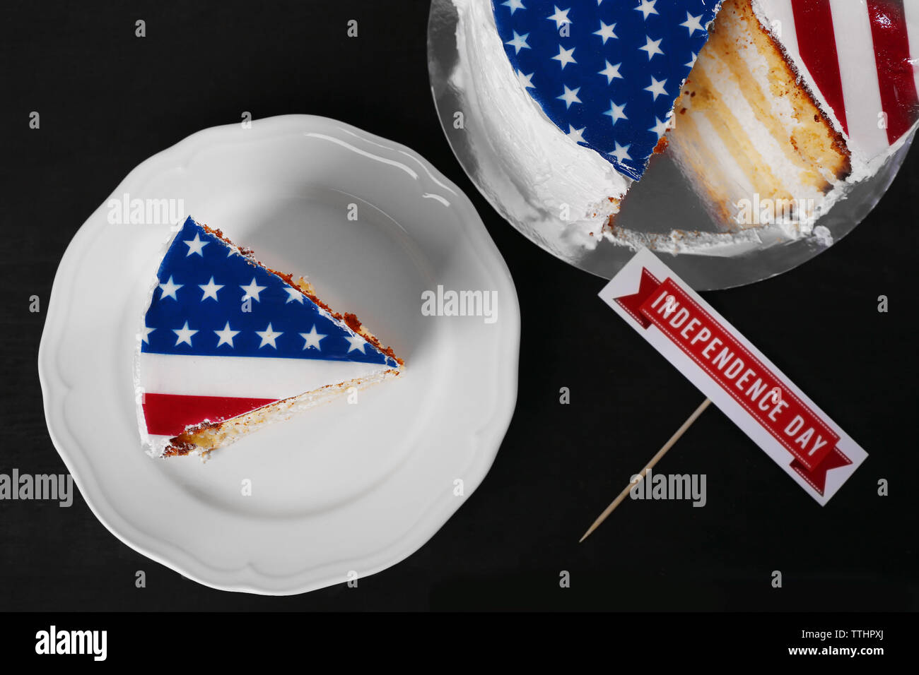 Piece of American flag cake. Independence day concept Stock Photo - Alamy