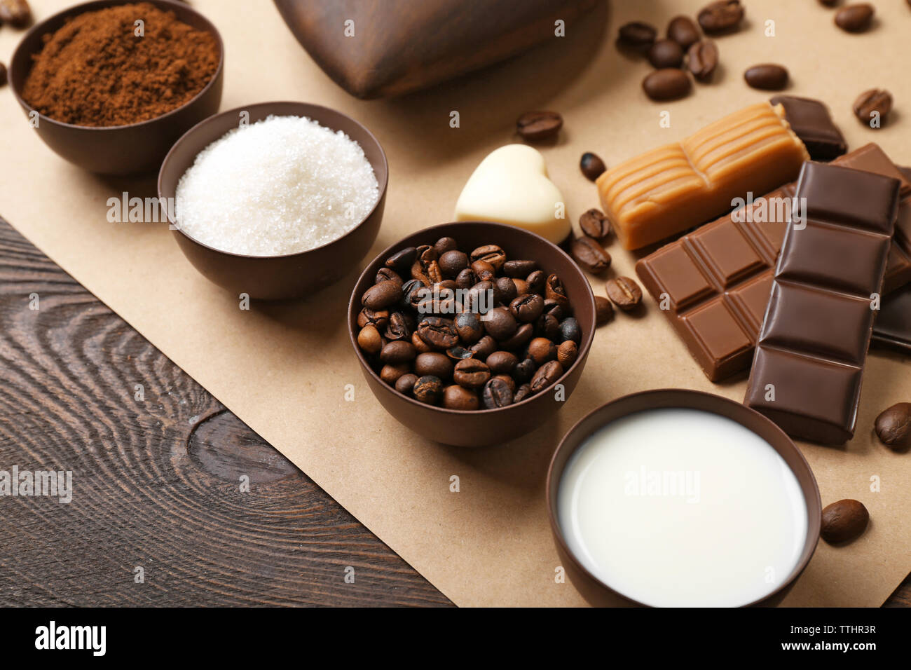 Coffee, sugar and milk on parchment, closeup Stock Photo - Alamy
