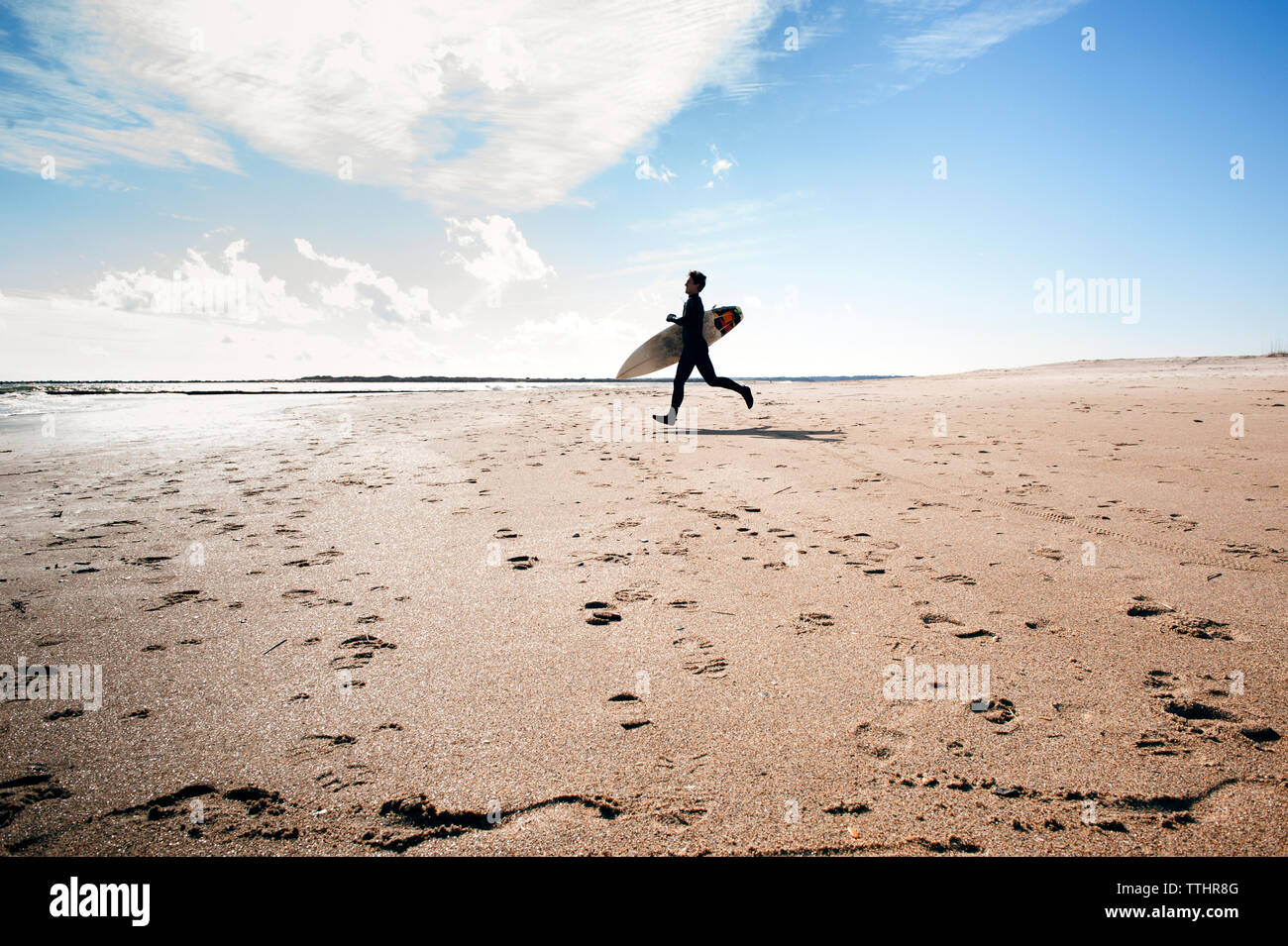 Man running sand hi-res stock photography and images - Alamy