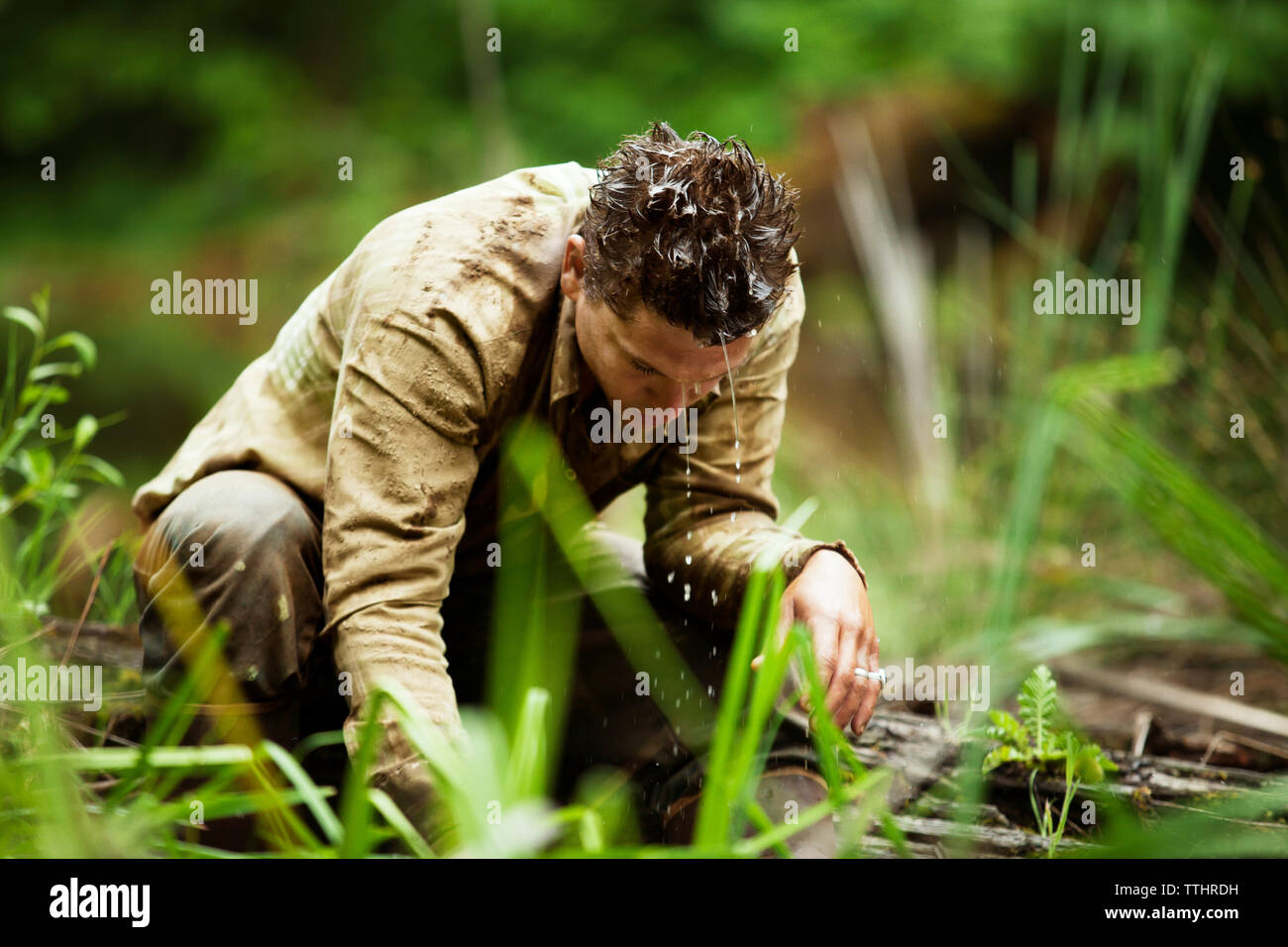 Face washing in river water hi-res stock photography and images - Alamy