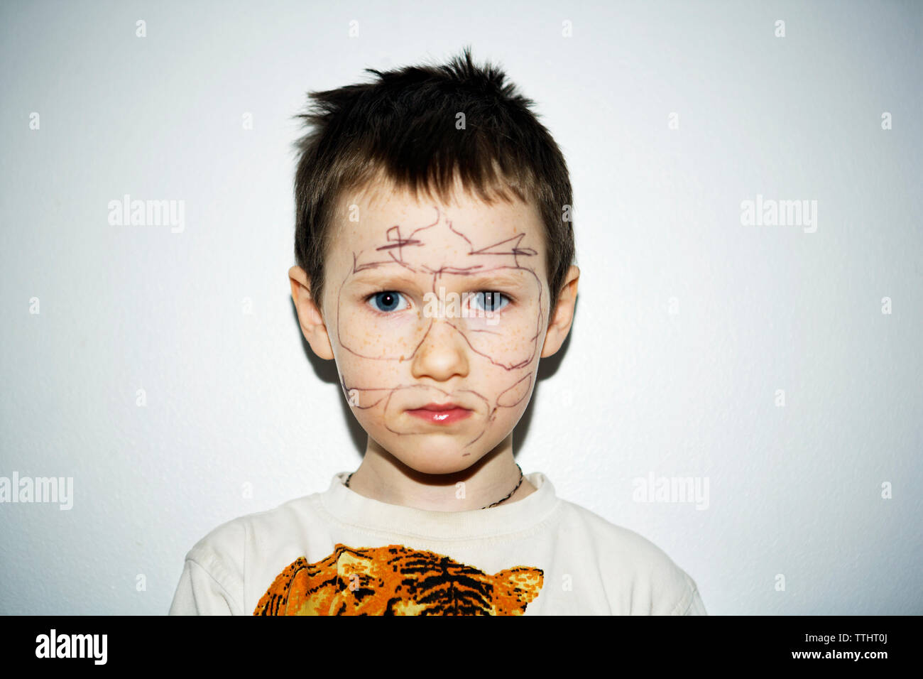 Portrait of boy with messy face Stock Photo - Alamy
