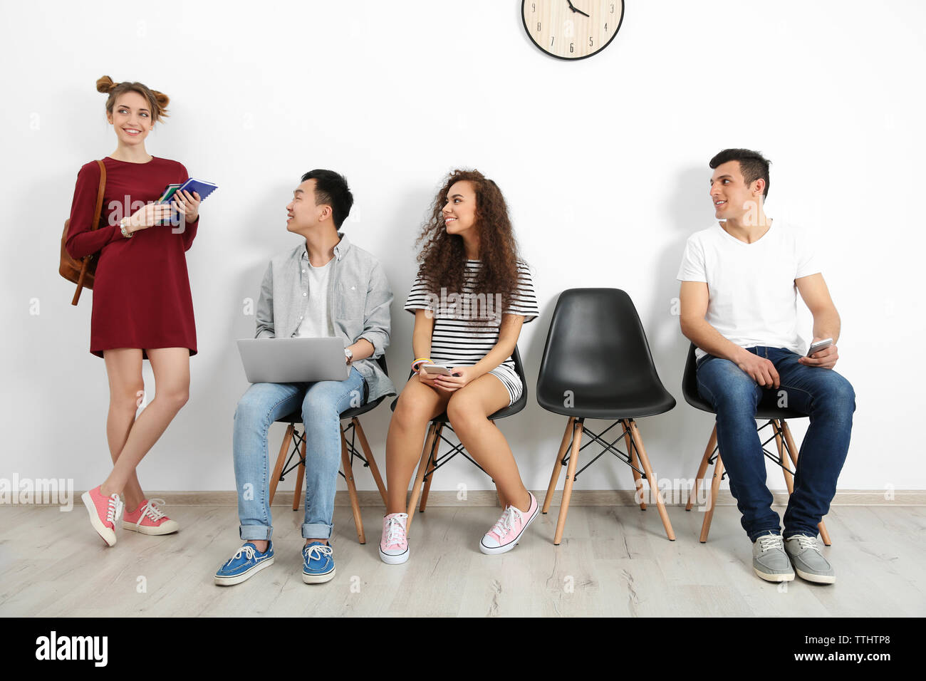 Group of people waiting for interview indoors Stock Photo - Alamy