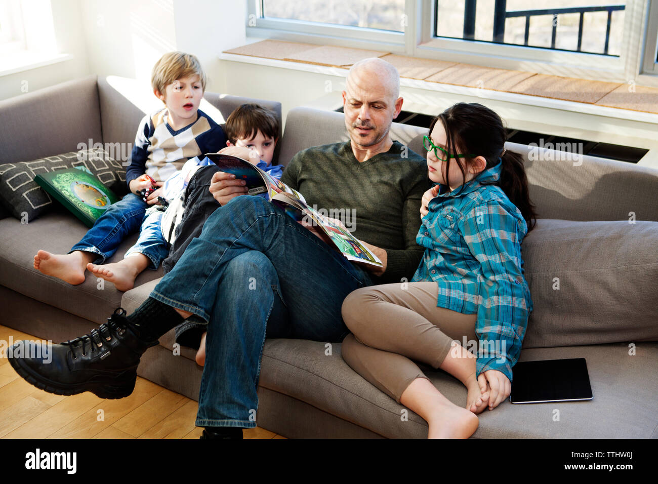 Adult reading comic hi-res stock photography and images - Alamy