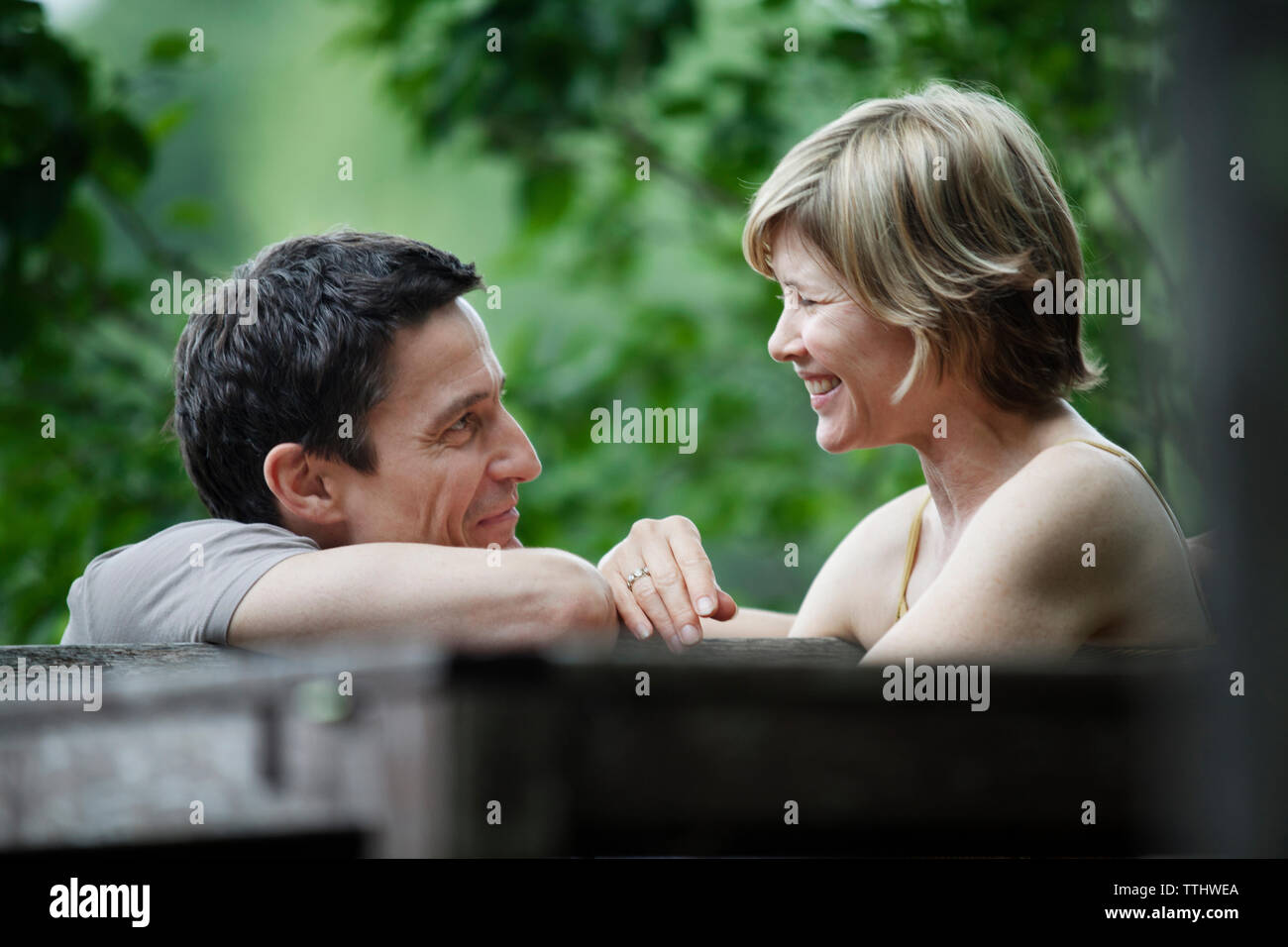 Two people fence talking hi-res stock photography and images - Alamy