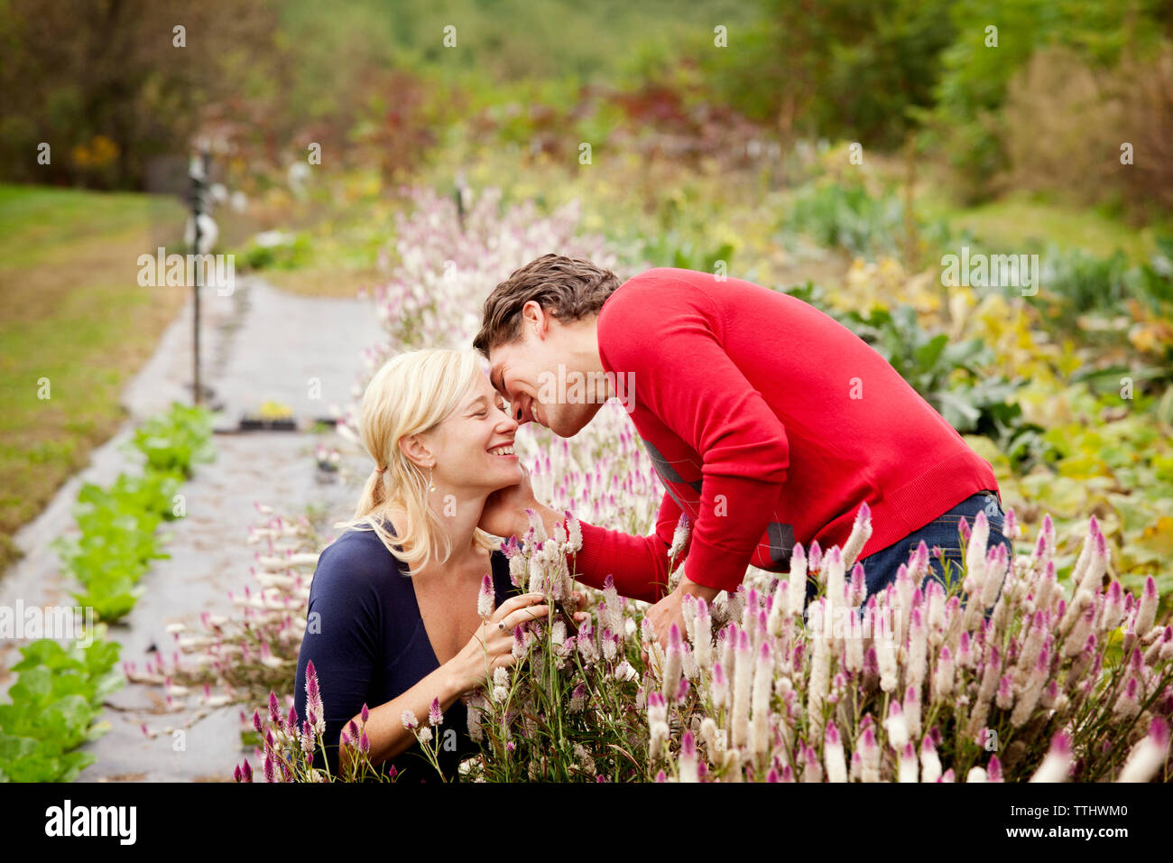 Happy romantic couple at farm Stock Photo - Alamy