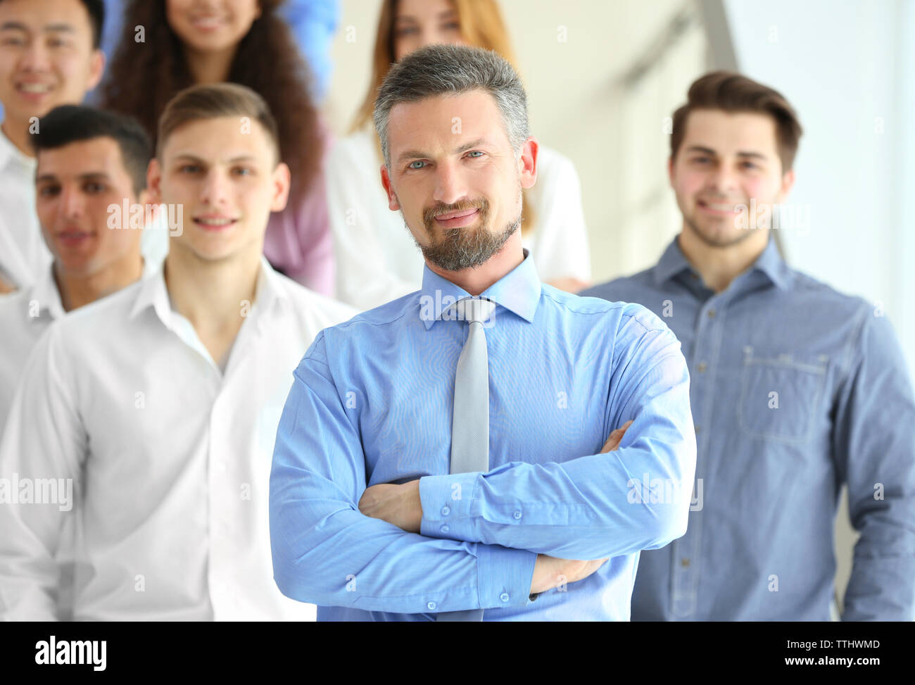 Group of people standing on the stairs Stock Photo - Alamy