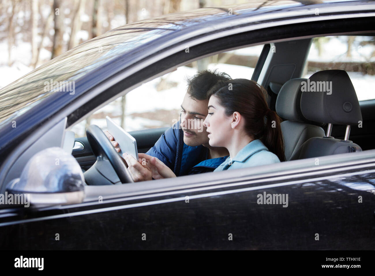 Sitting holding technology connection communication hi-res stock ...