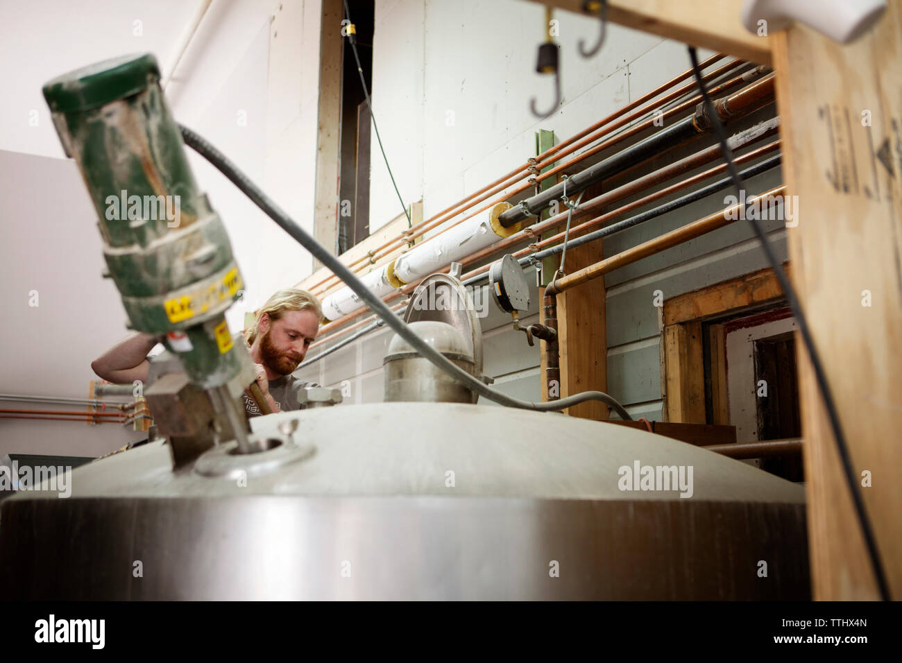 Whiskey distillery worker hi-res stock photography and images - Alamy