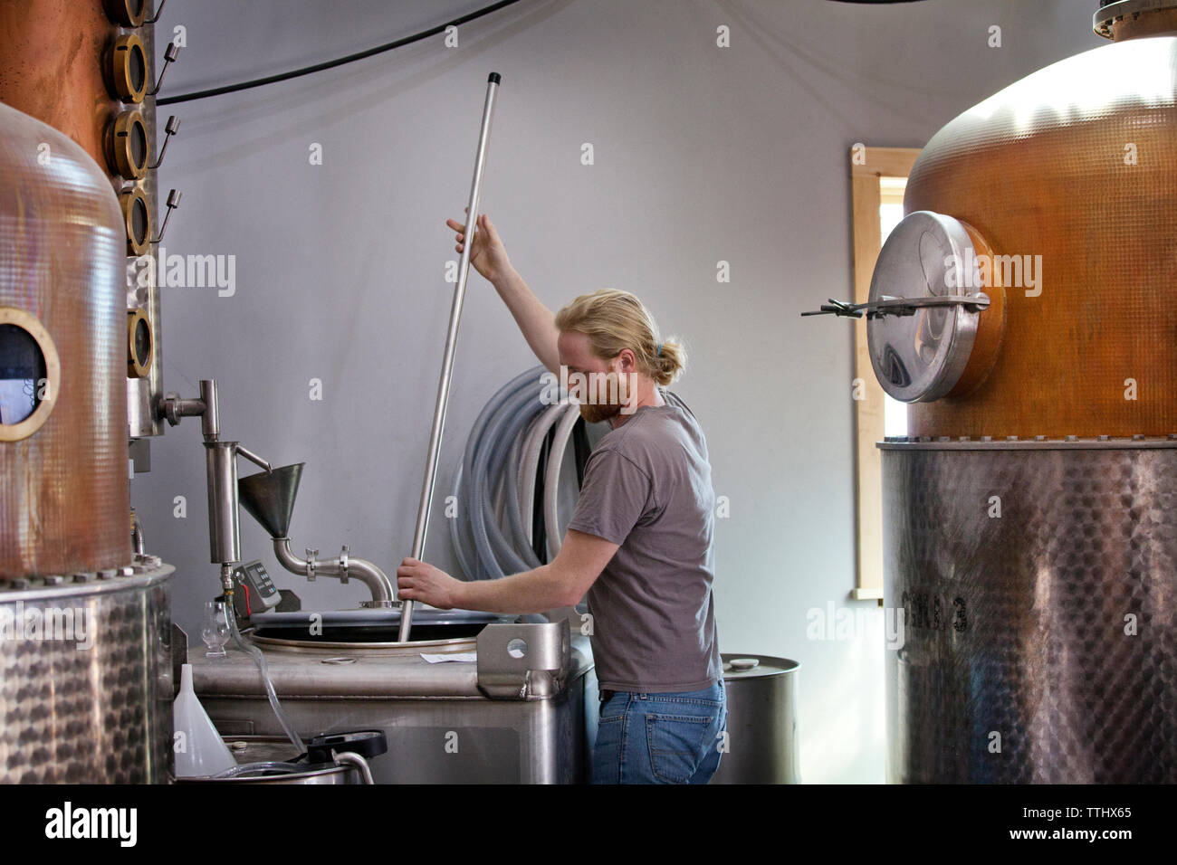Whiskey distillery worker hi-res stock photography and images - Alamy