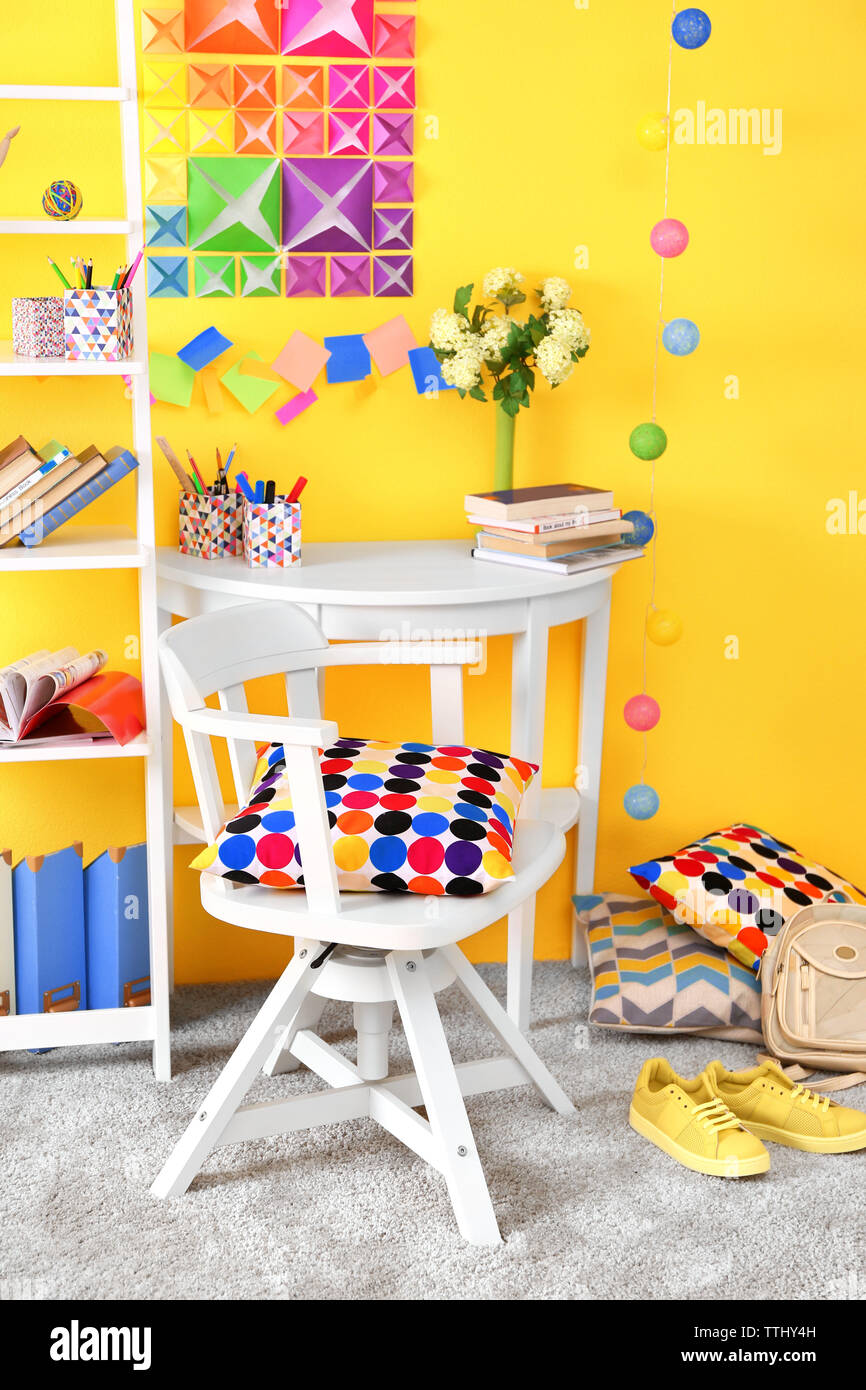 Workplace for teenager with table and chair Stock Photo - Alamy