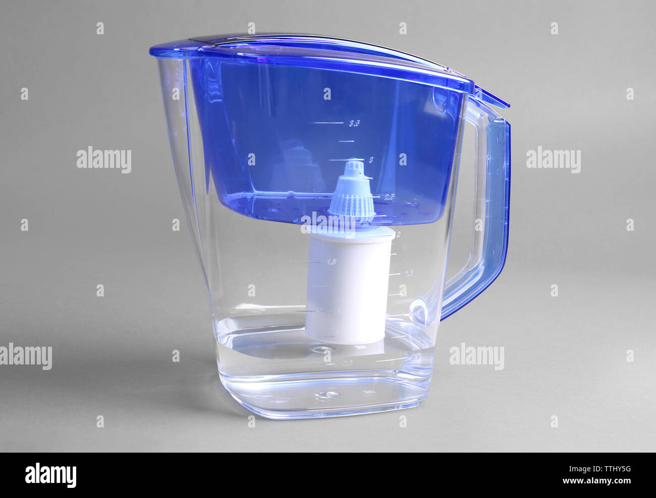 Water filter jug on the grey background Stock Photo - Alamy