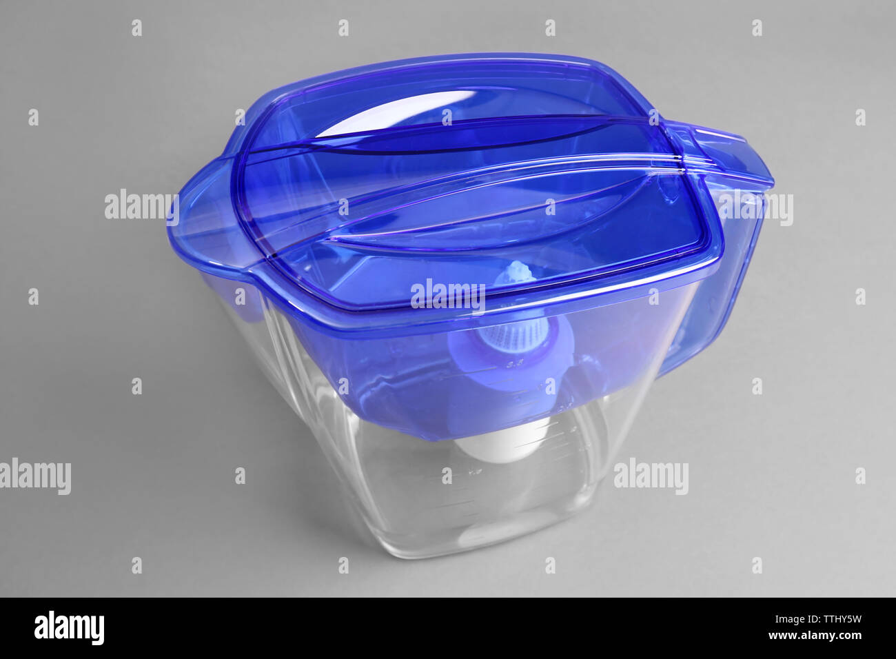 Water filter jug on the grey background Stock Photo - Alamy