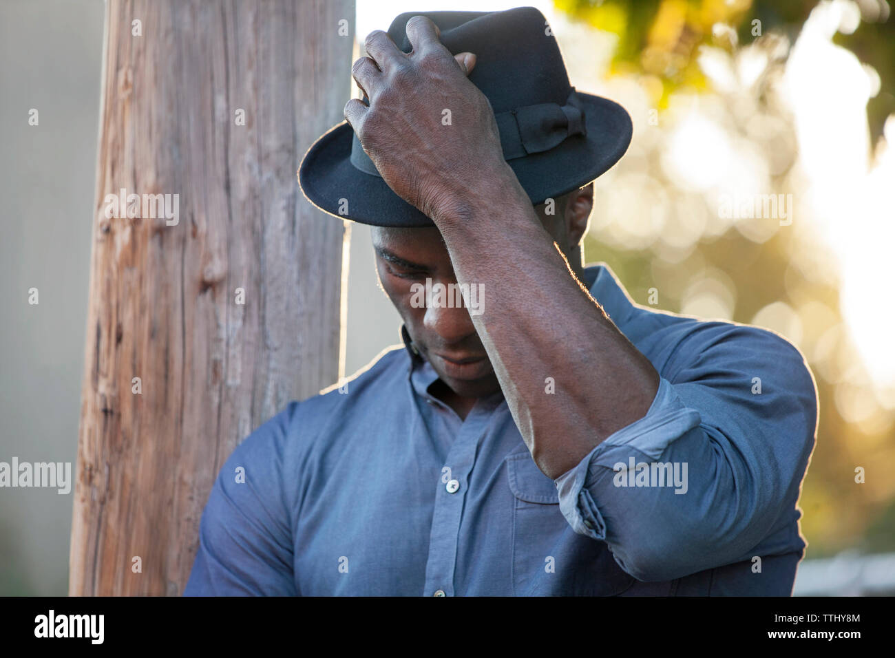 Holding hat hi-res stock photography and images - Alamy