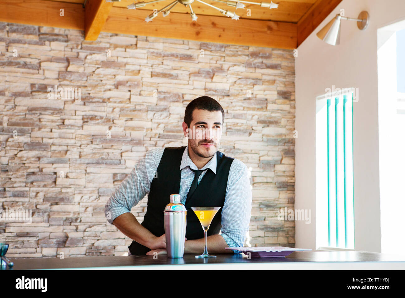 Man standing at bar hi-res stock photography and images - Alamy