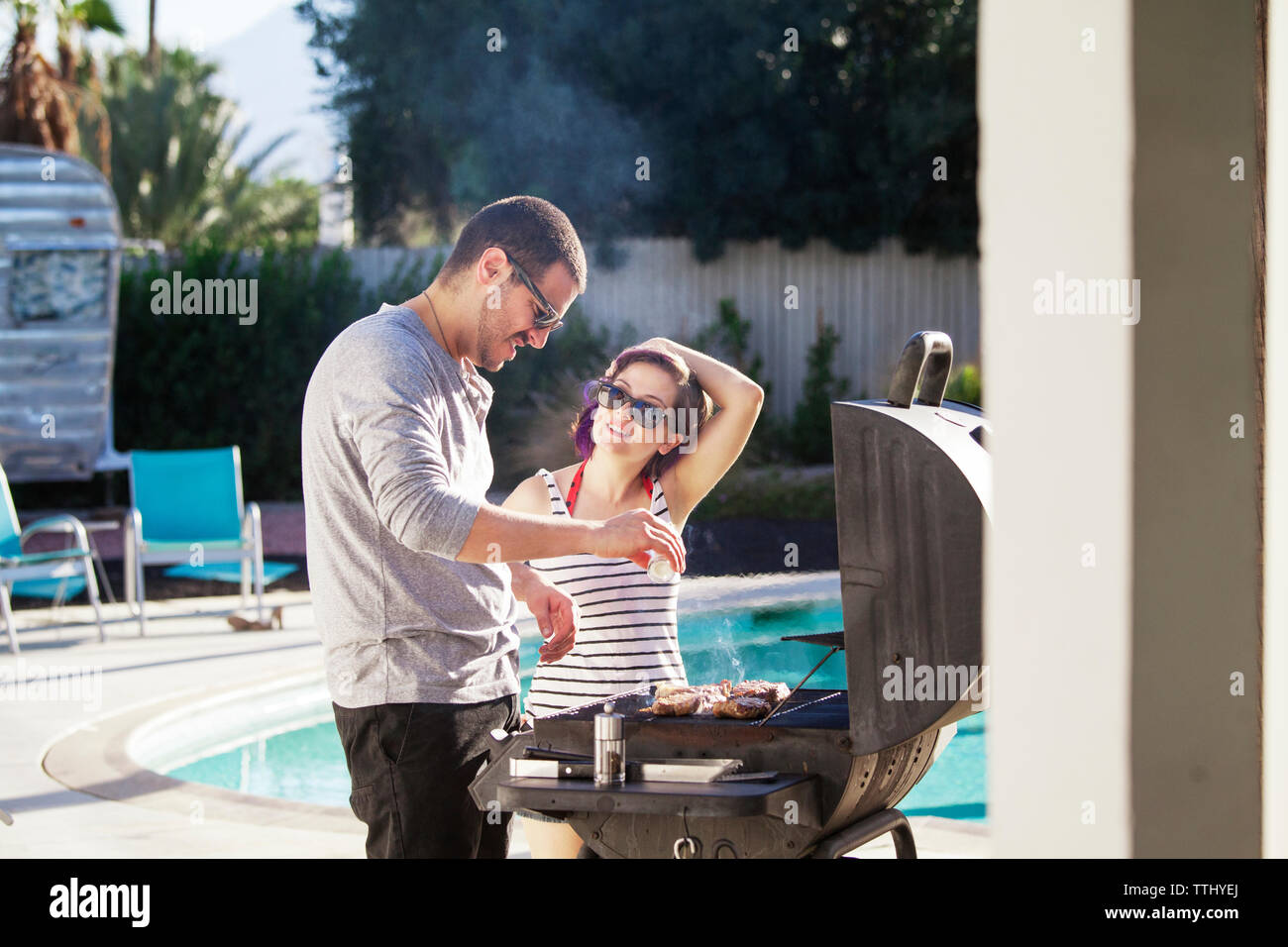 Swimming pool barbecue hi-res stock photography and images - Alamy