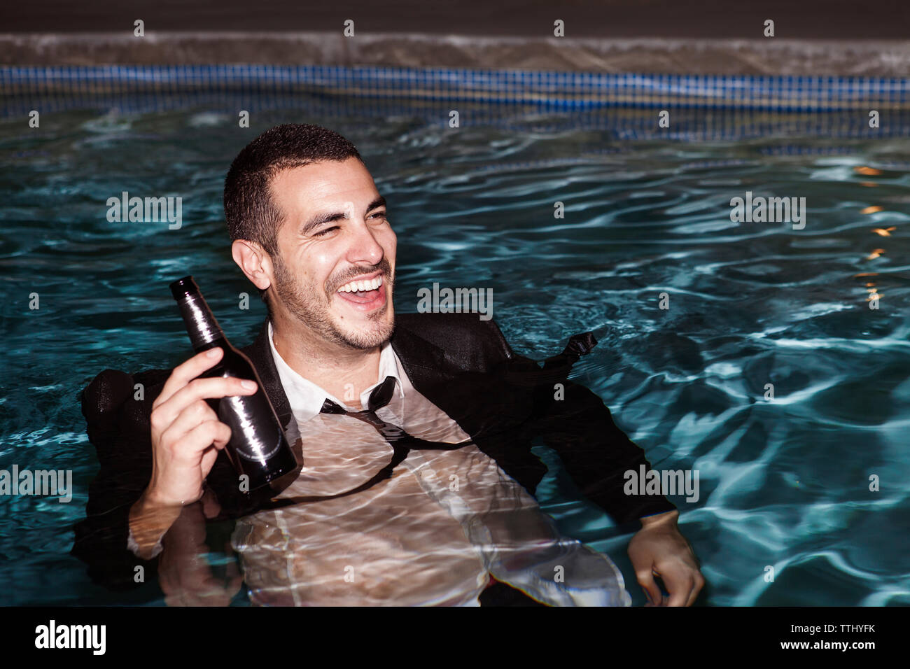 Old man happy pool hi-res stock photography and images - Alamy
