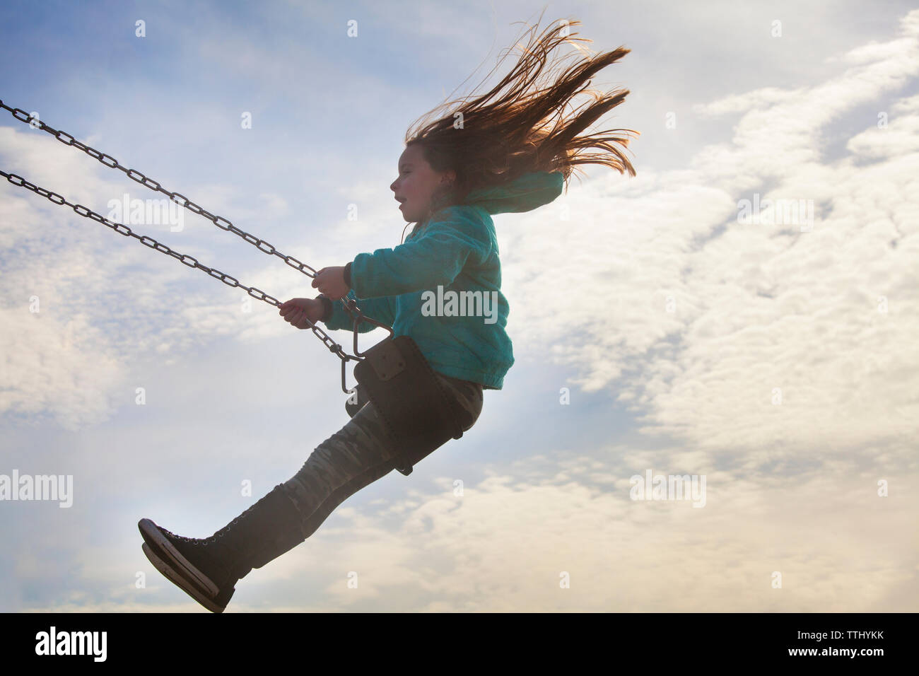 Using a swing hi-res stock photography and images - Alamy