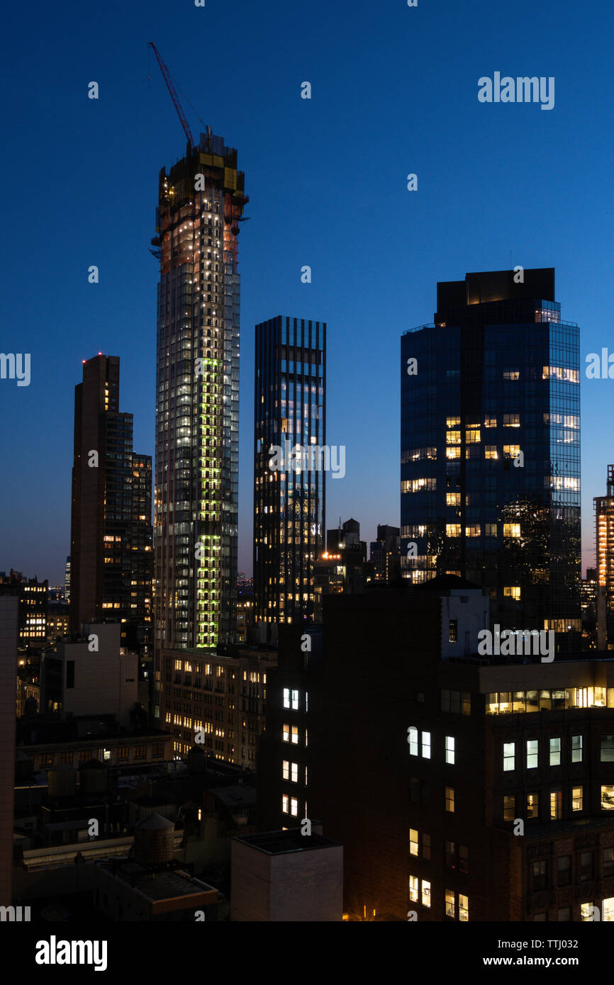 High-rise building construction at night in New York City, USA Stock ...