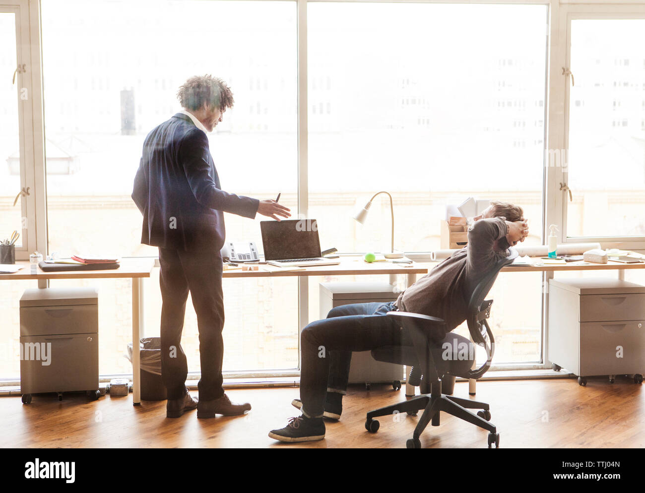 Man Standing Behind Chair High Resolution Stock Photography and Images ...