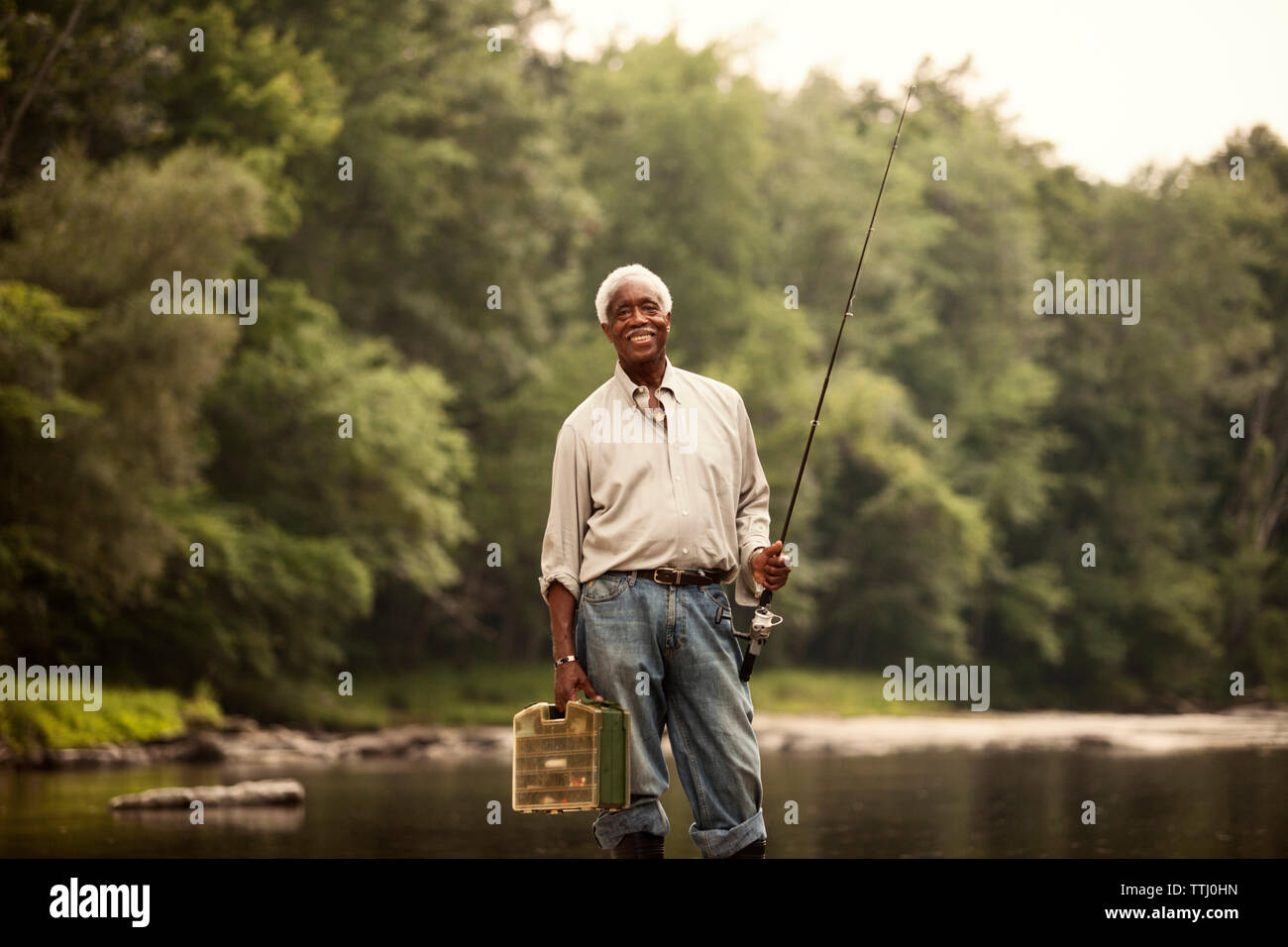 Old man with rod hi-res stock photography and images - Alamy