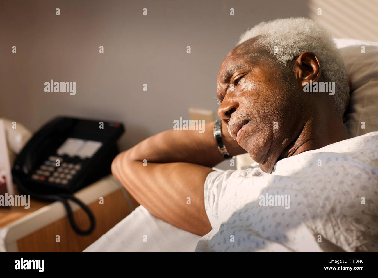 Old man hospital bed hi-res stock photography and images - Alamy