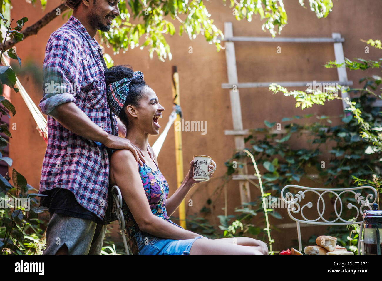 Man hands on womans shoulders hi-res stock photography and images - Alamy