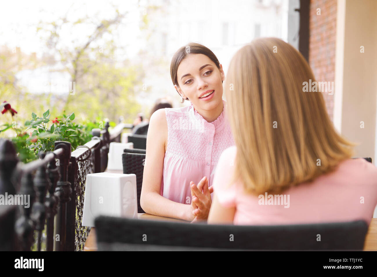 Two women talk manager hi-res stock photography and images - Alamy