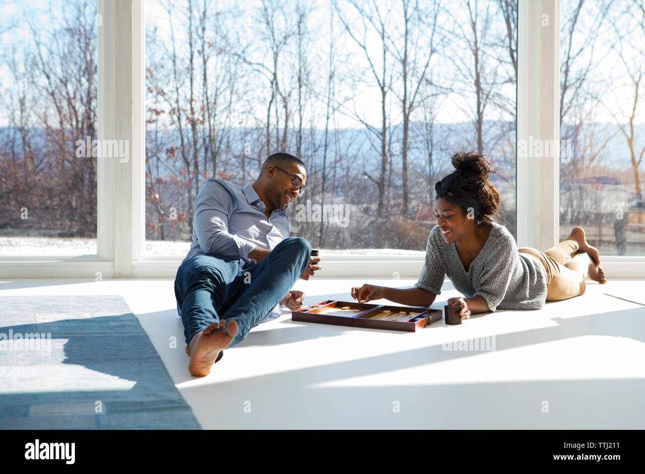 Playing backgammon hi-res stock photography and images - Alamy