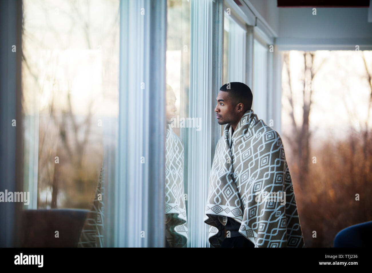 Man covered in blanket hi-res stock photography and images - Alamy