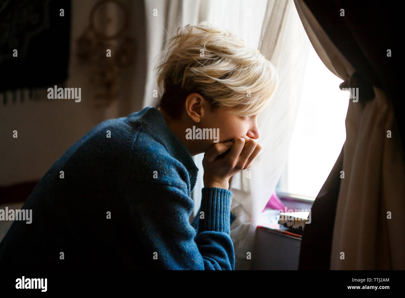 Woman hand on window hi-res stock photography and images - Alamy