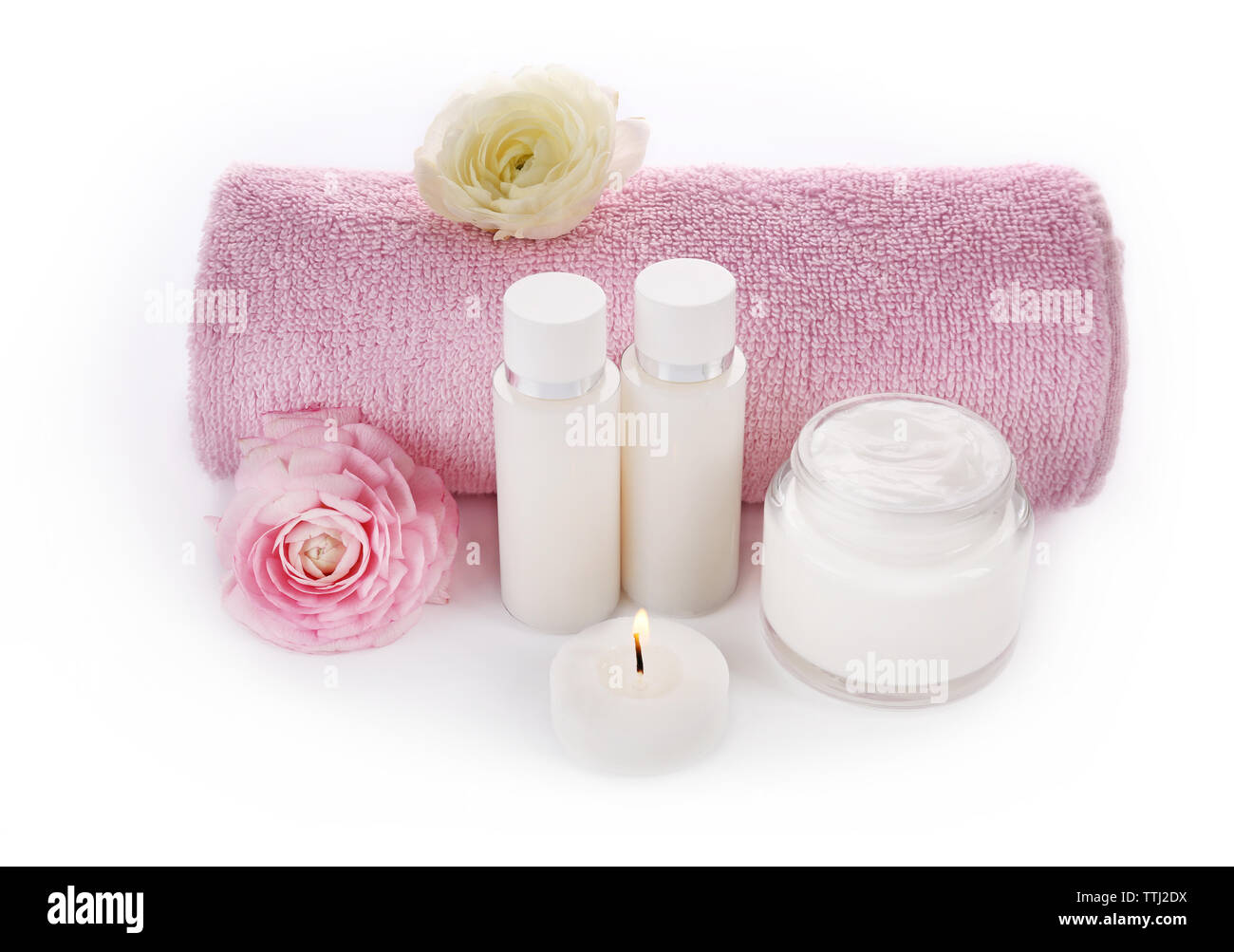 Spa treatment with towel and cream isolated on white Stock Photo - Alamy