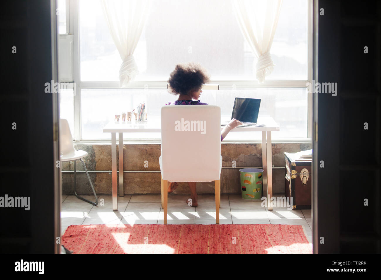 Woman table rear view shadow hi-res stock photography and images - Alamy