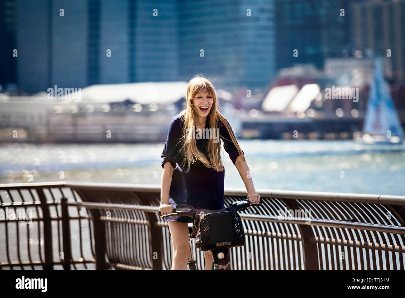 Woman Cycling Promenade High Resolution Stock Photography and Images ...