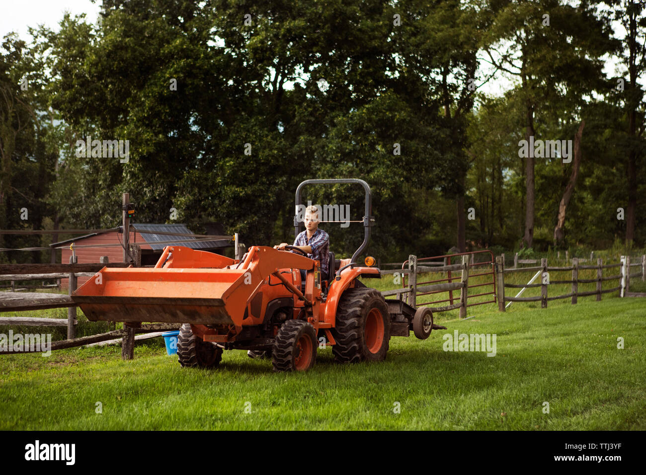 Man driving tractor hi-res stock photography and images - Alamy