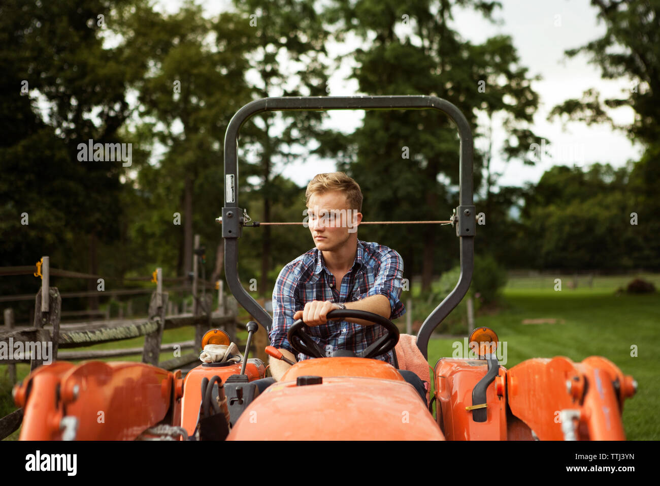 Driving tractor hi-res stock photography and images - Alamy