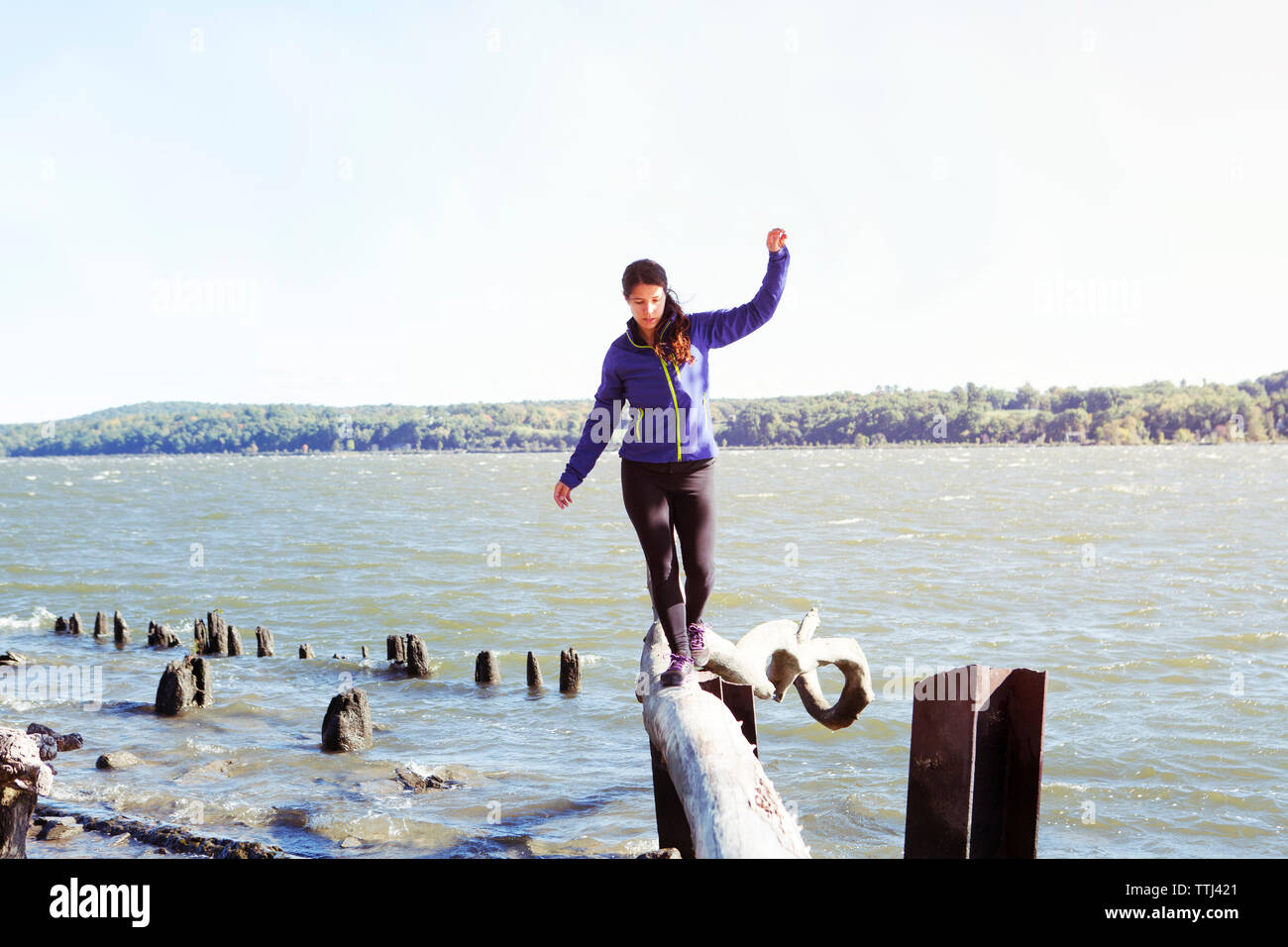 Adult female log balancing hi-res stock photography and images - Alamy