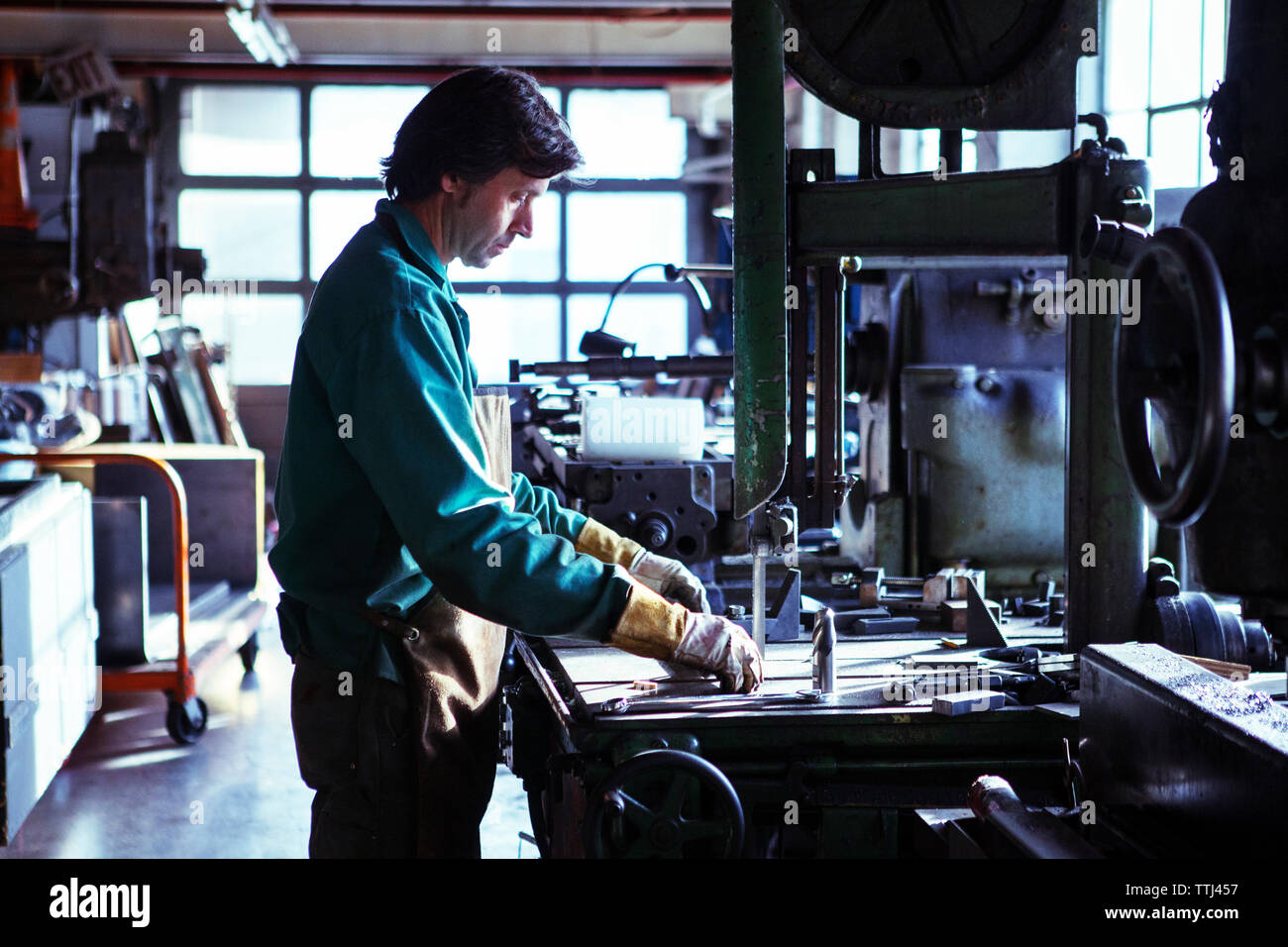 Side view man worker hi-res stock photography and images - Alamy