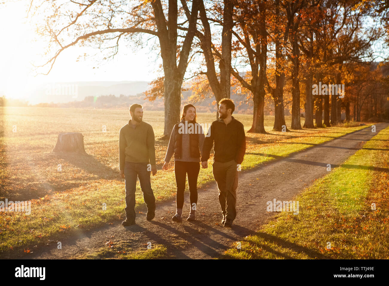 Walking friends autumn hi-res stock photography and images - Alamy