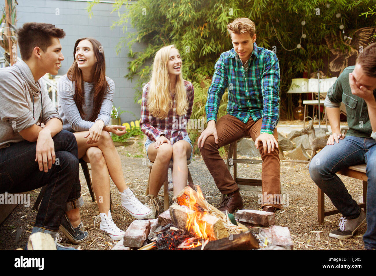Five sitting together hi-res stock photography and images - Alamy
