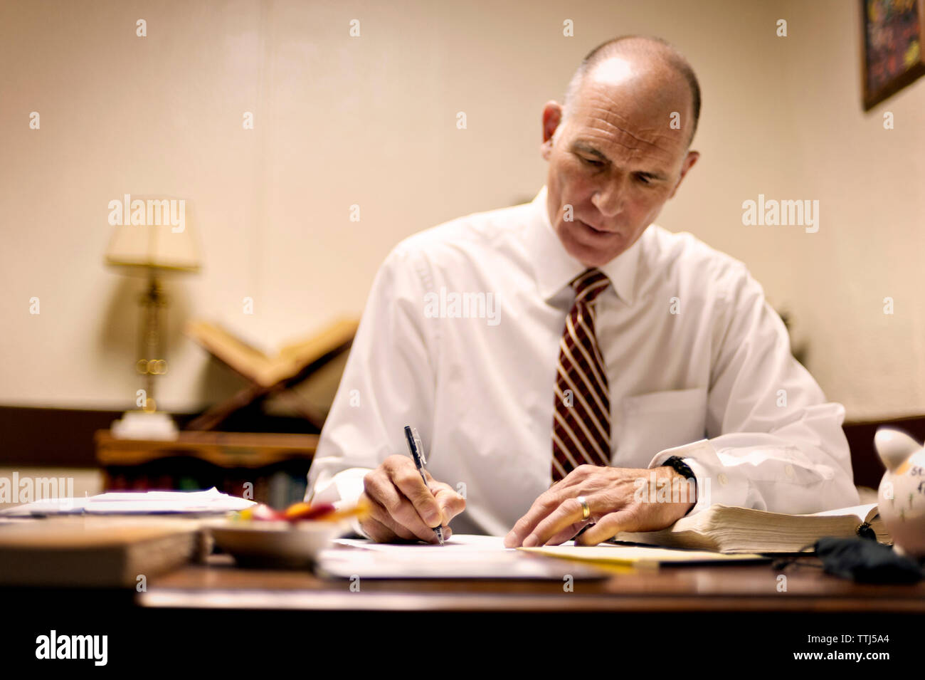 Priest working hi-res stock photography and images - Alamy