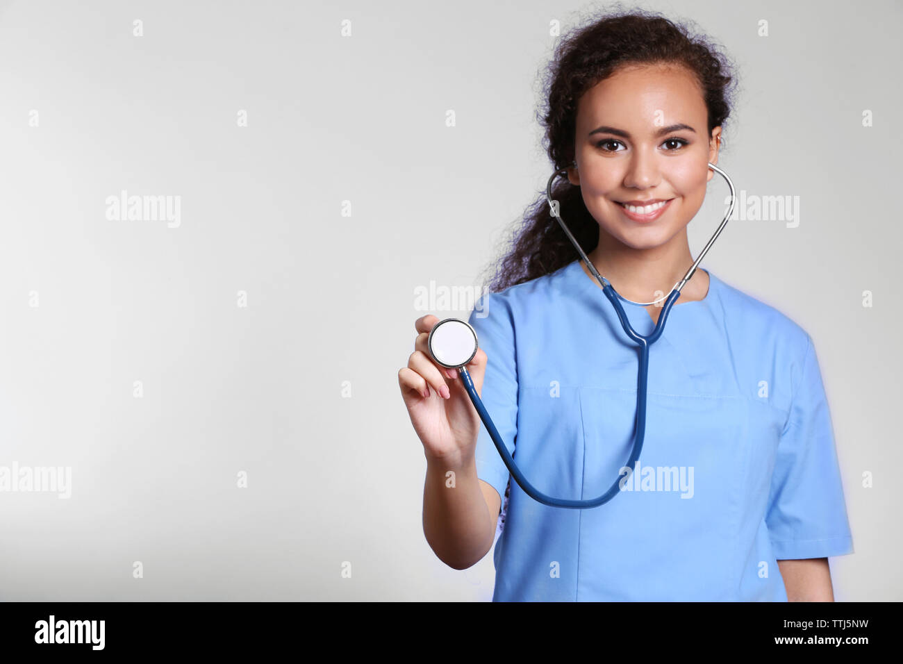 African american female doctor holding hi-res stock photography and ...