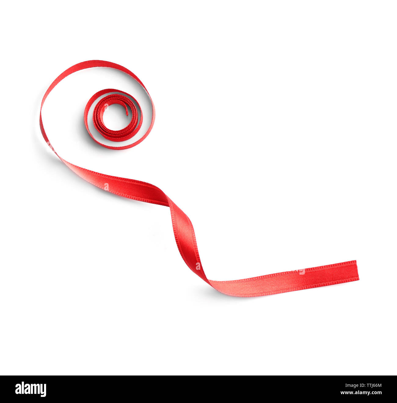 Red ribbon on light background Stock Photo - Alamy