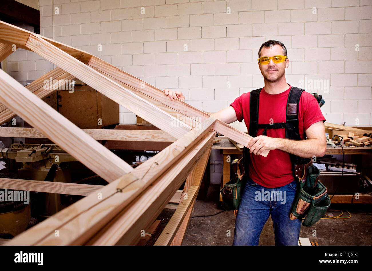 Portrait of carpenter working in workshop Stock Photo - Alamy