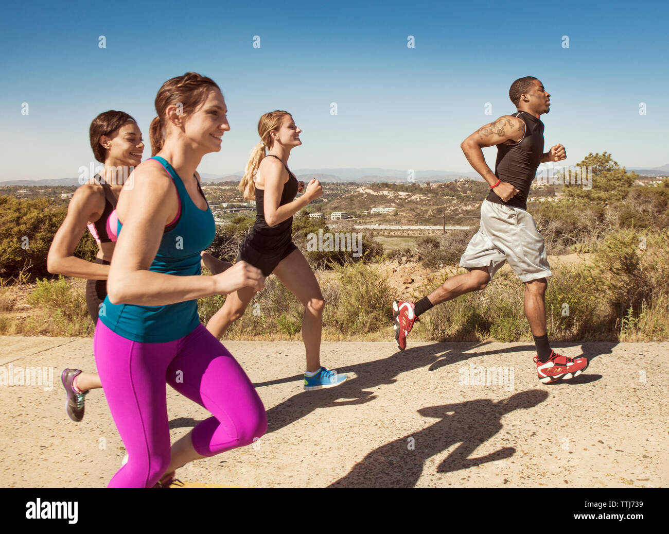 Female fitness friends running on hi-res stock photography and images ...