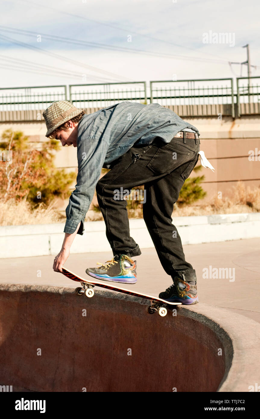 Man skateboarding on skate ramp Stock Photo - Alamy