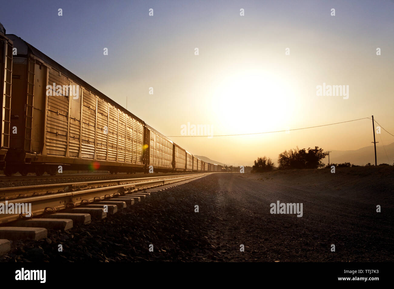 Freight train on track Stock Photo - Alamy