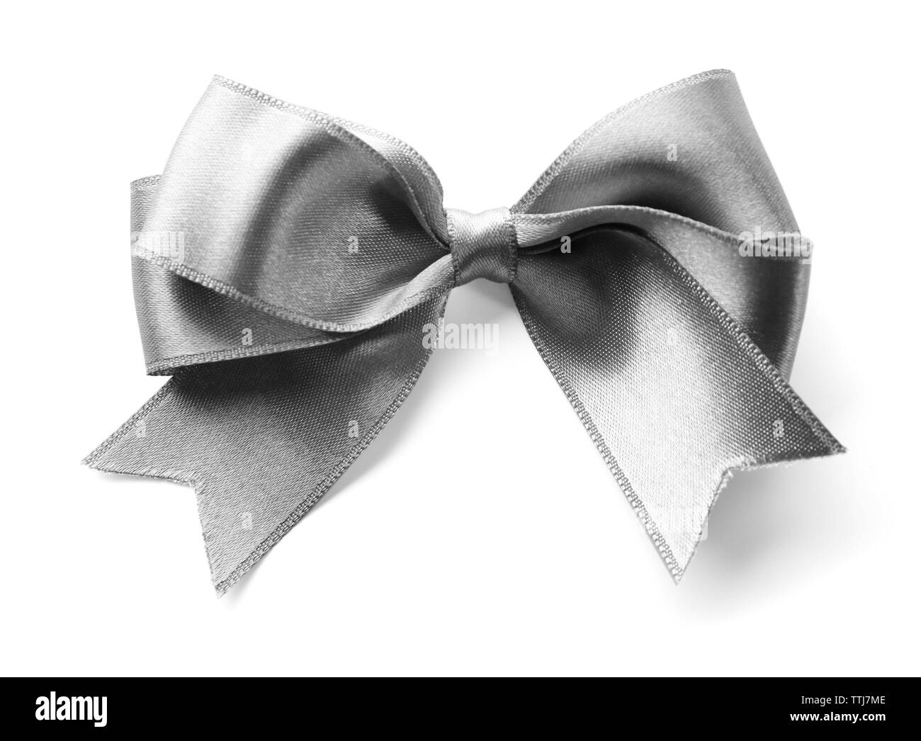 Grey ribbon bow on a white background Stock Photo - Alamy
