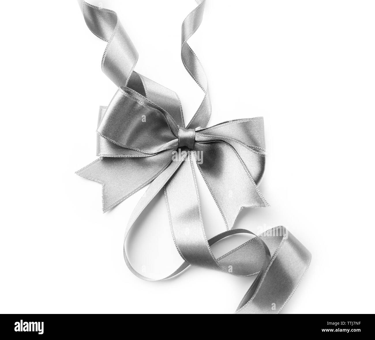 Grey ribbon bow on a white background Stock Photo - Alamy