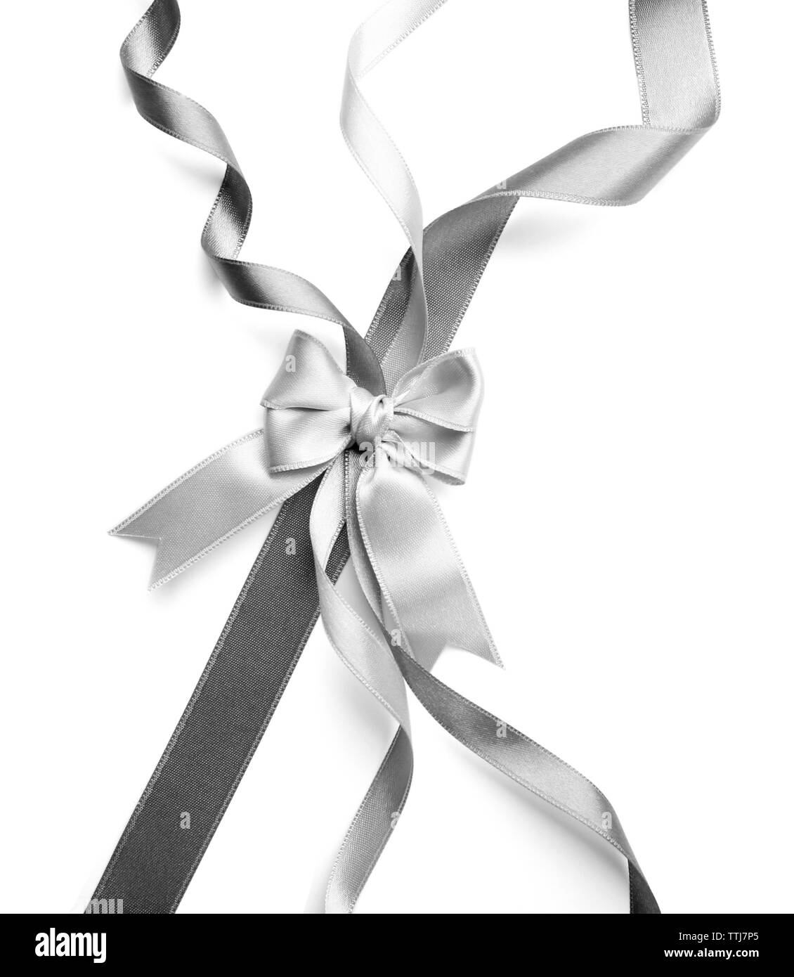 Grey ribbon bow on a white background Stock Photo - Alamy